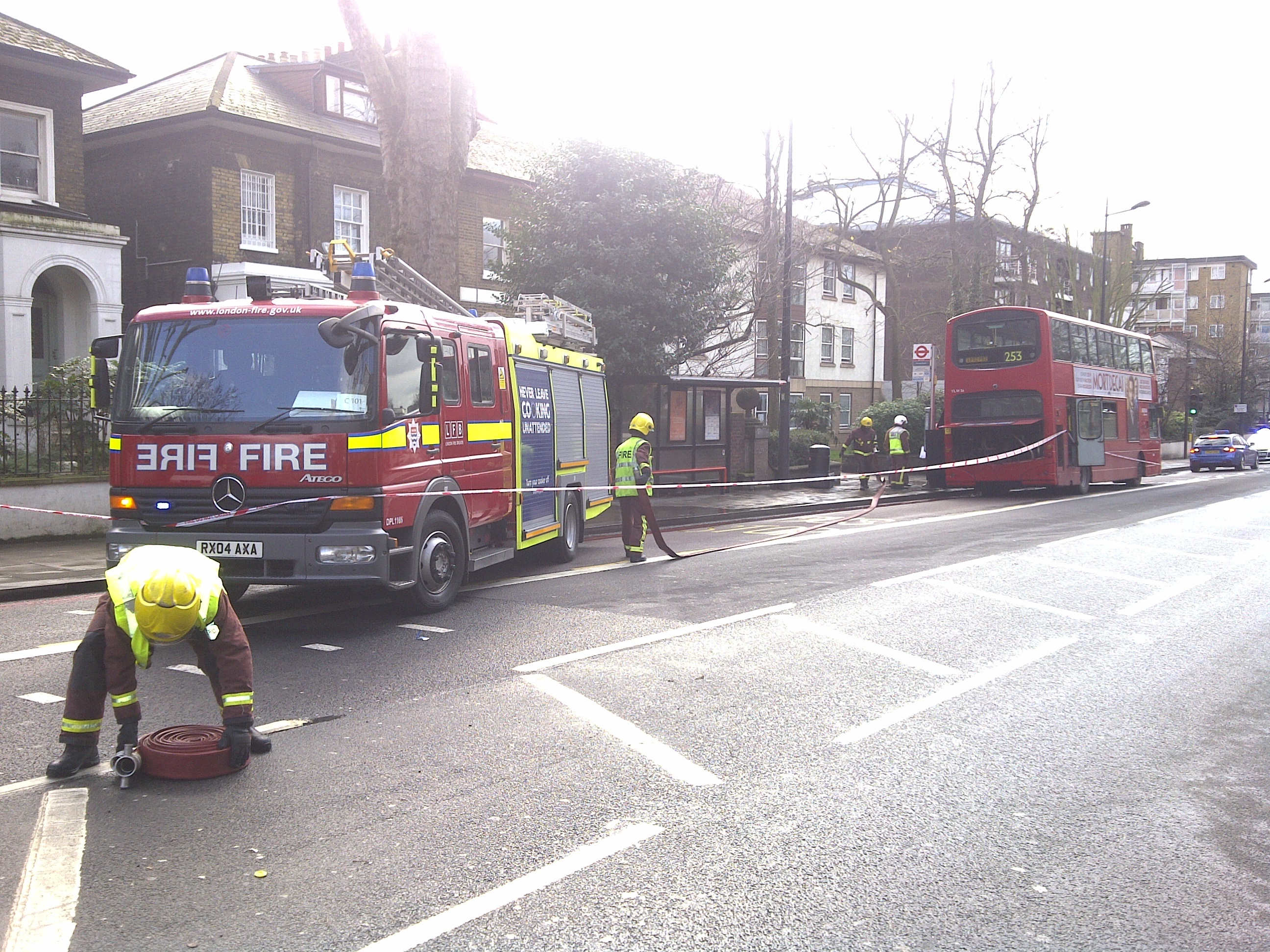 Bus blaze in Camden Road on day of firefighters' strike over pensions ...