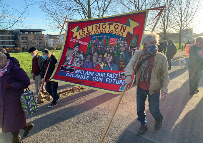 Masks, banners and songs as Corbyn activists stage park protest ...